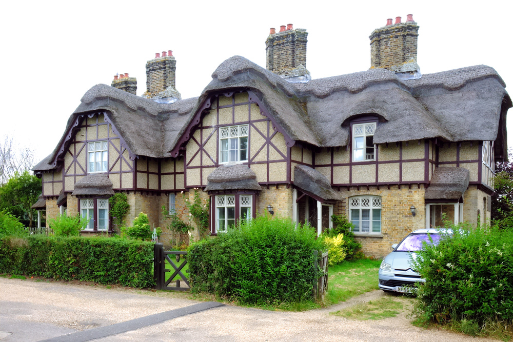 Estate cottage in the Suffolk village of Somerleyton in England. One of ...
